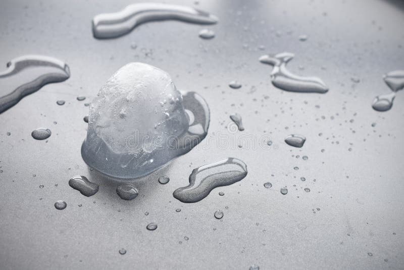Single Melting Ice Cube stock photo. Image of slippery - 174621880