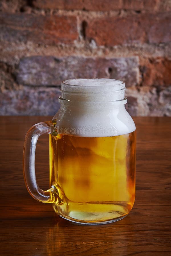 Single Mug of Beer on Table Stock Photo - Image of nightclub, rustic ...