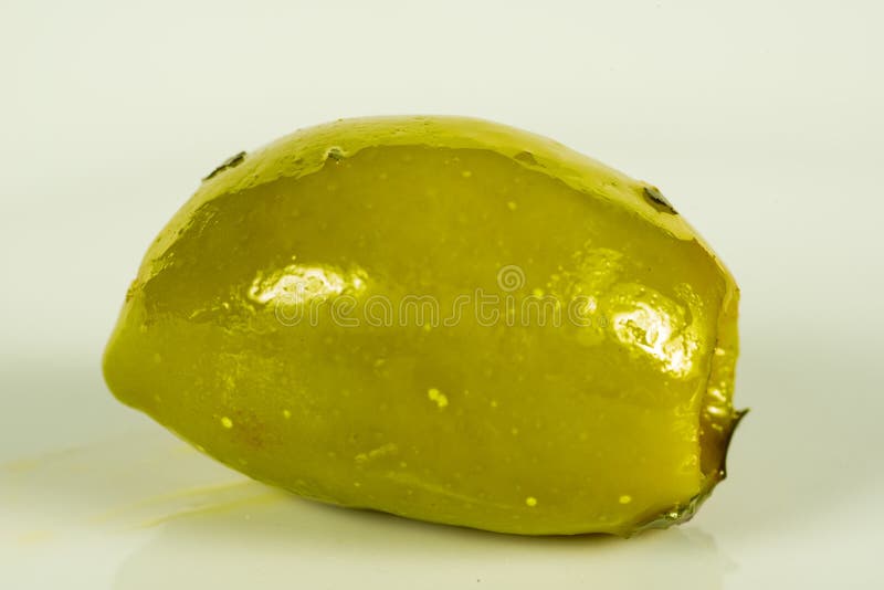 A Single Olive Coated in Oil Stock Photo - Image of coated, ingredient ...