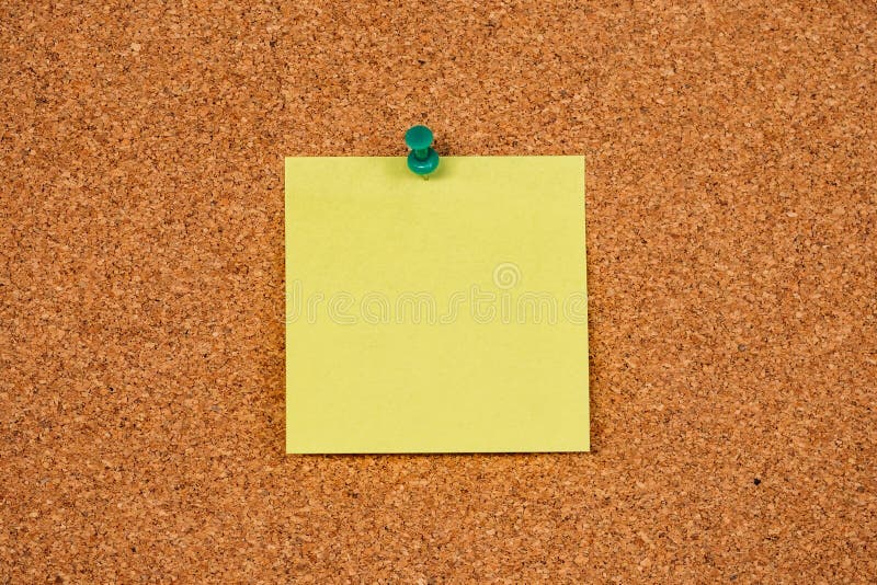 Single One Empty Yellow Post-it Sticky Note on a Cork Board with ...