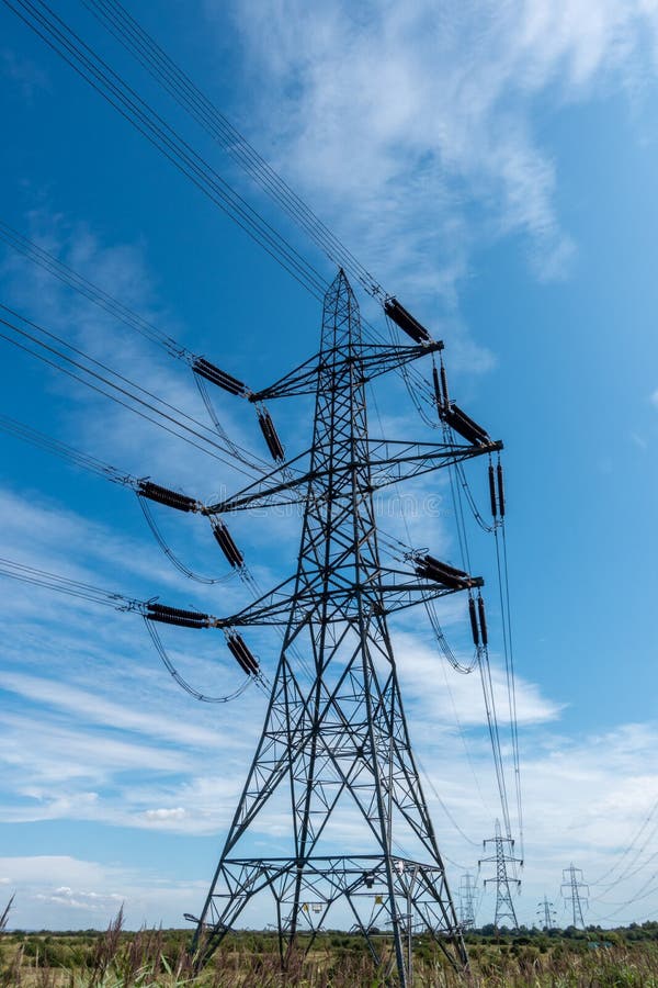 An overhead power line stock image. Image of utility, transmission ...