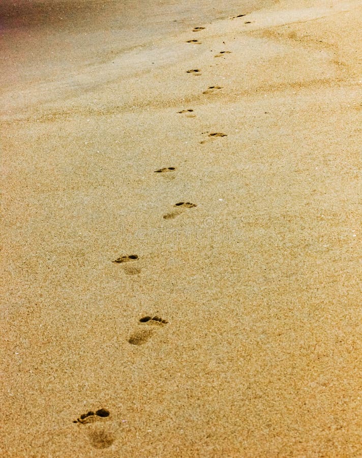 Single Pair of Footsteps on Beach Gradually Walking Away.alone Stock ...