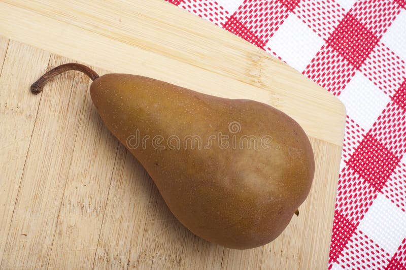 Single Pear stock photo. Image of cutting, checkered - 16560782