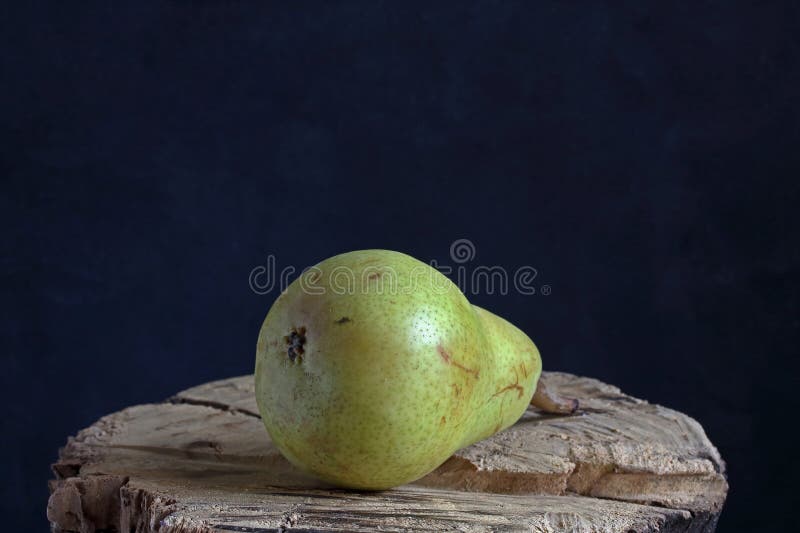 Single Pear on a Piece of Wood Stock Image - Image of fruit, natural ...