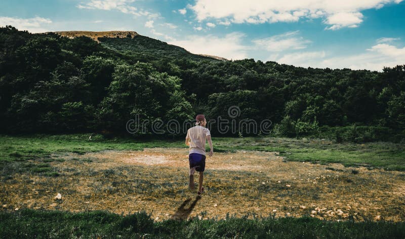A Single Person Walk Alone on the Wide Nature Landscape Stock Image ...