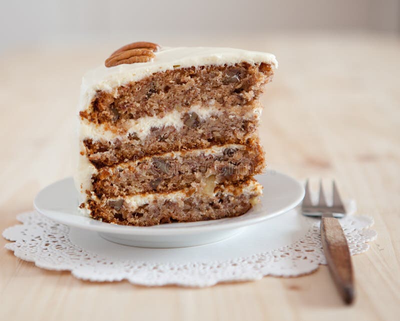 A Single Piece of Hummingbird Cake with Pecans Stock Photo - Image of ...