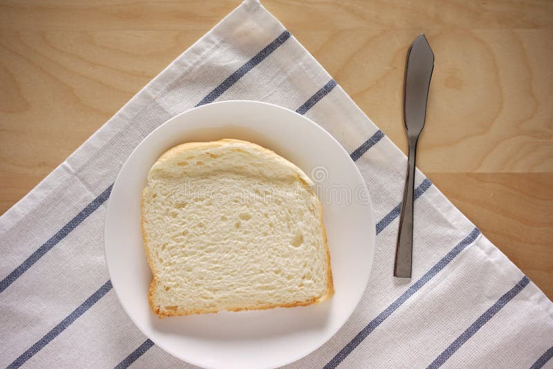 Single Piece of White Bread on Table Top Stock Image - Image of ...