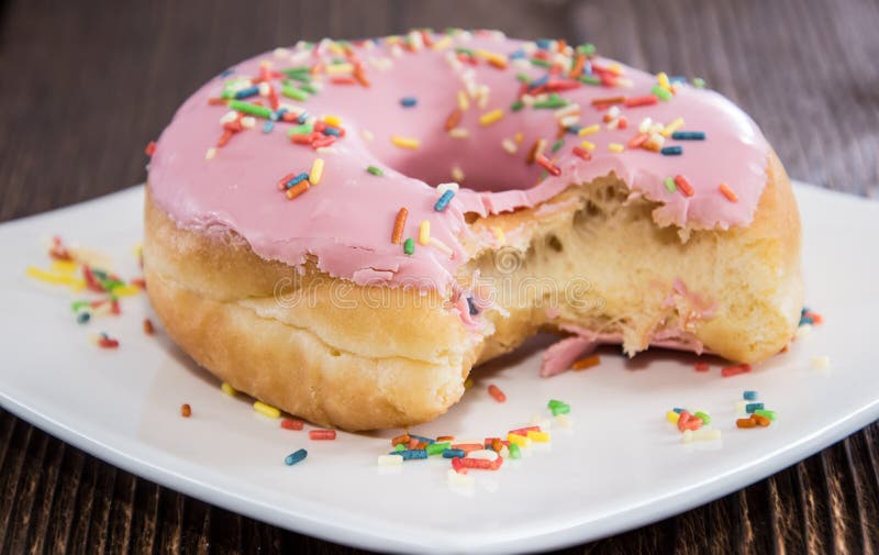 Single Pink Donut on a Plate Stock Image - Image of round, donuts: 29283849