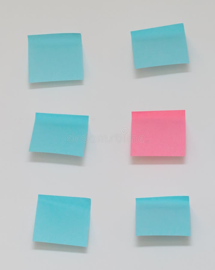Single Pink Post it Note in Sea of Blue Post Notes Stock Image - Image ...