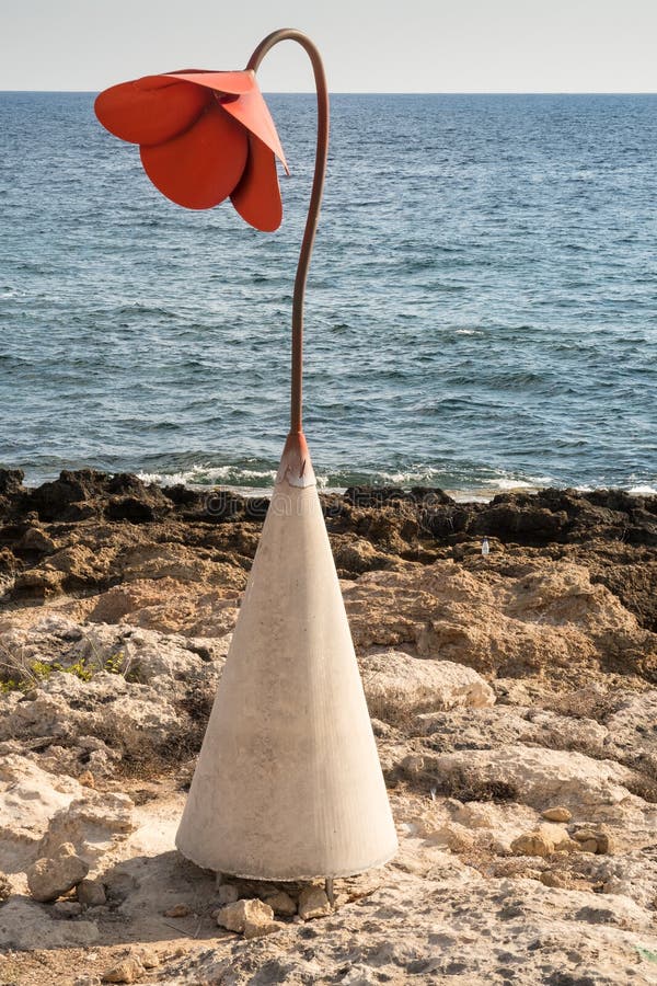 A Single Poppy by the Beach Stock Image - Image of statue, remembrance ...