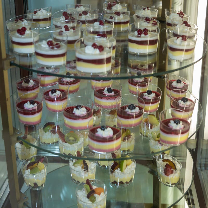 Single Portions of Mousse Packaged Inside a Pastry Display Stand Stock ...