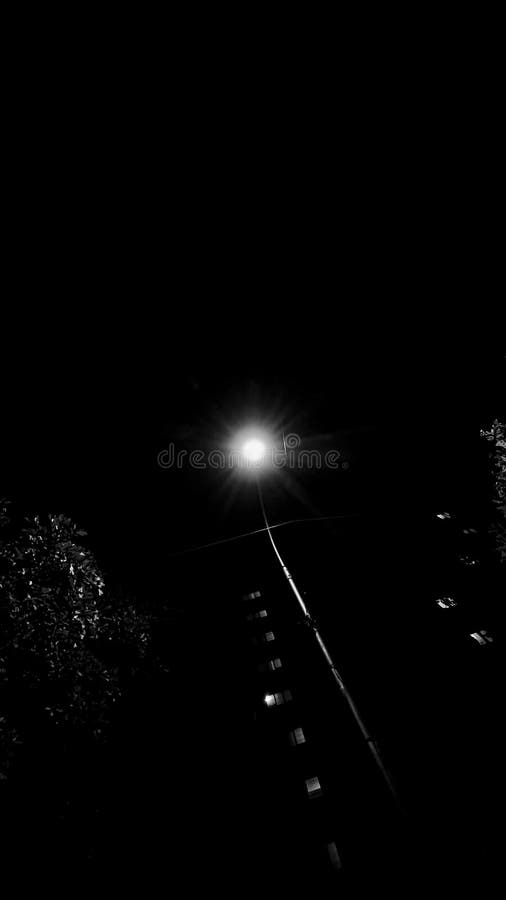 A Single Post Light Glowing in an Extreme Dark Area Stock Photo - Image ...