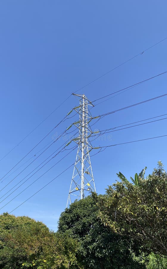 Single Power Tower stock photo. Image of dusk, ecologically - 311225476