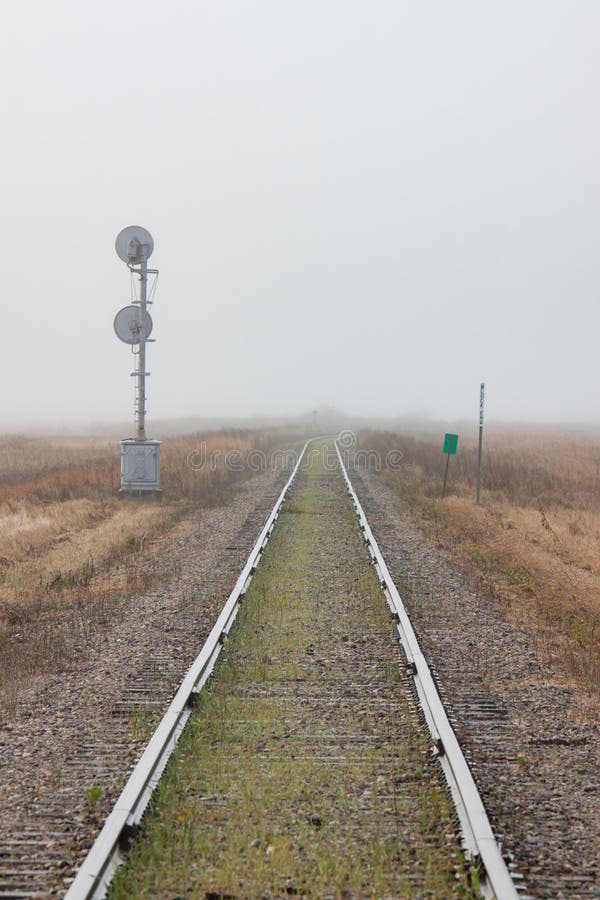 Single Railroad Track Receding into Fog Stock Image - Image of ...