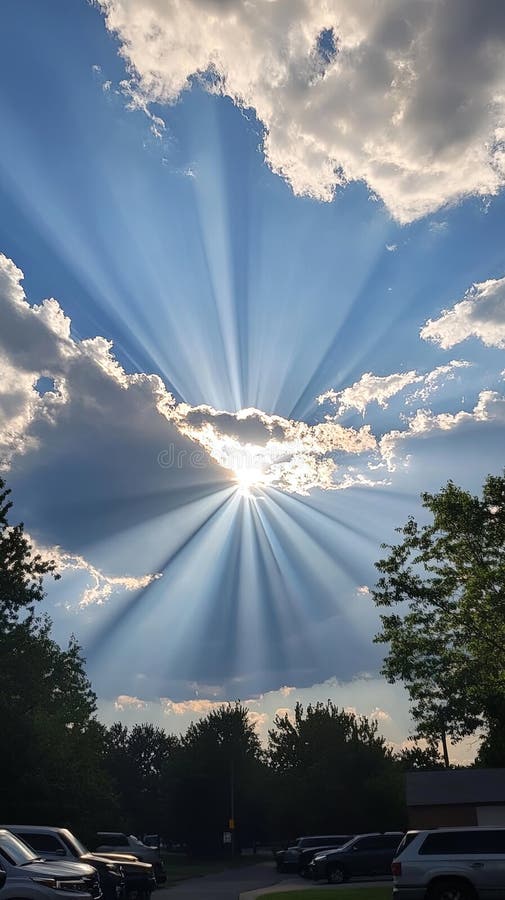 A Single Ray of Sunlight Breaking through Clouds Picture Stock Photo ...