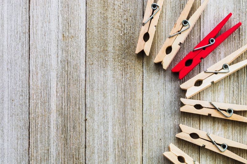 Single Red Clothespin in a Row of Ordinary Colored Ones/abstract ...