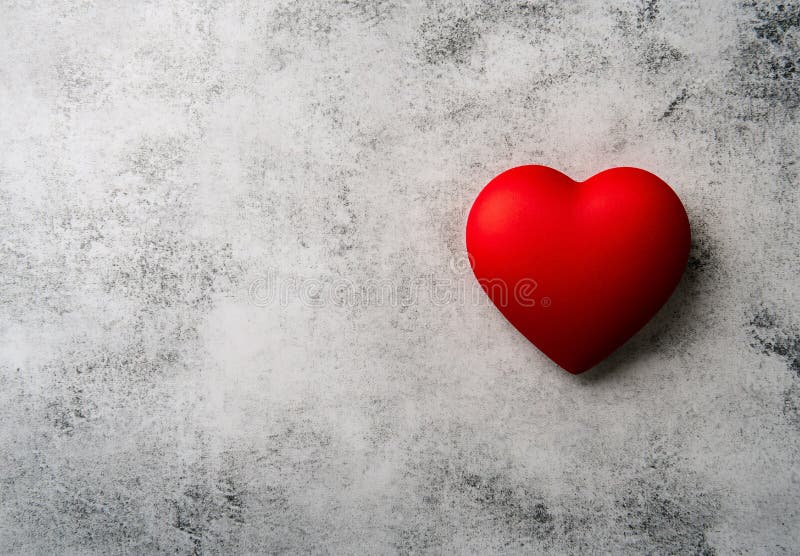 Single Red Heart on Grey Textured Background High Quality Image Stock ...