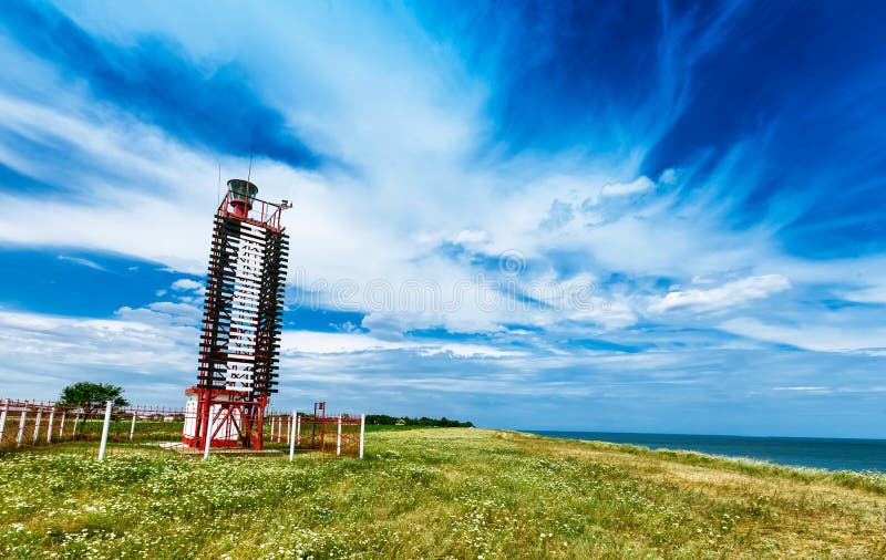 Single red lighthouse stock image. Image of focus, field - 57015899