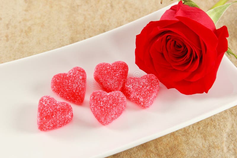 Single Red Rose with Five Candy Hearts Stock Photo - Image of love ...
