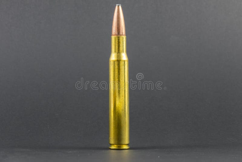 Single Rifle Bullet on White Surface Stock Photo - Image of crime, lead ...