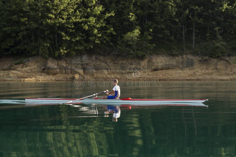 Single rower at sunrise stock image. Image of lifestyle - 7060693
