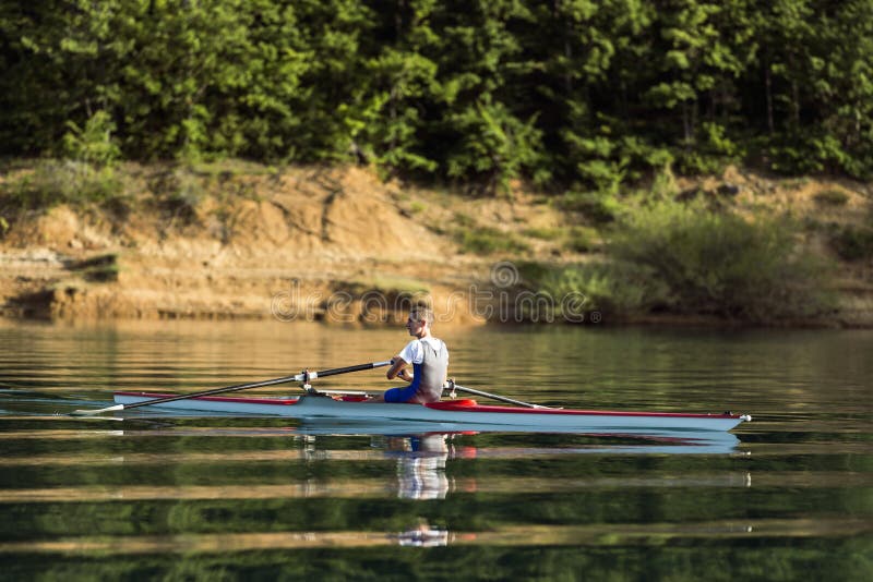 Single rower at sunrise stock photo. Image of race, hobby - 86095336