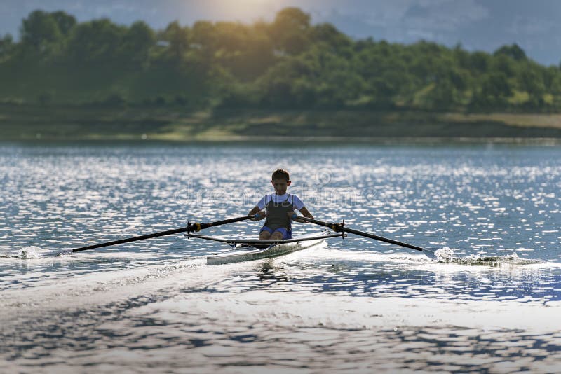 Single rower at sunrise stock image. Image of lifestyle - 7060693