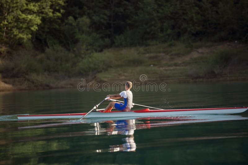 Single rower at sunrise stock image. Image of lifestyle - 7060693
