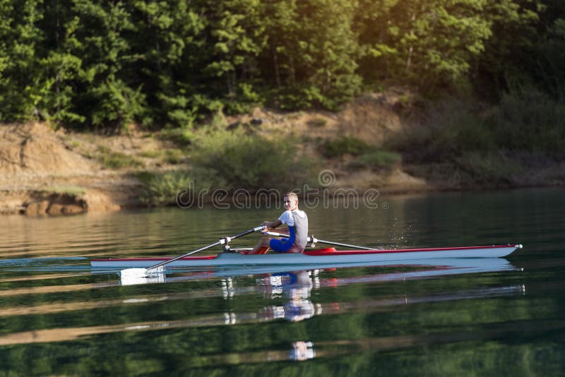 Single rower at sunrise stock image. Image of lifestyle - 7060693