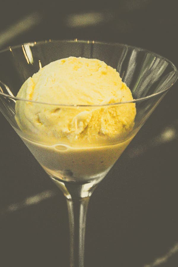A Single Scoop of Vanila Gelato Served in Martini Glass Stock Photo ...