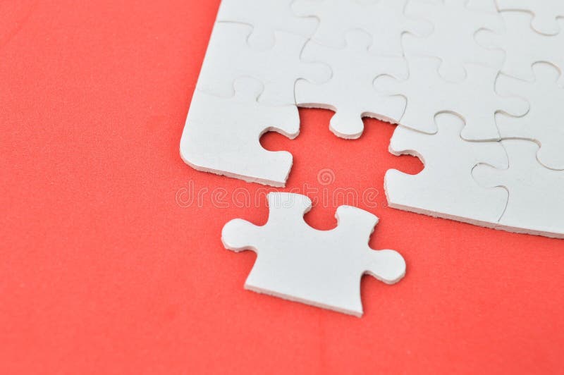 Single, Separated Part of a White Puzzle on the Red Background. Stock ...