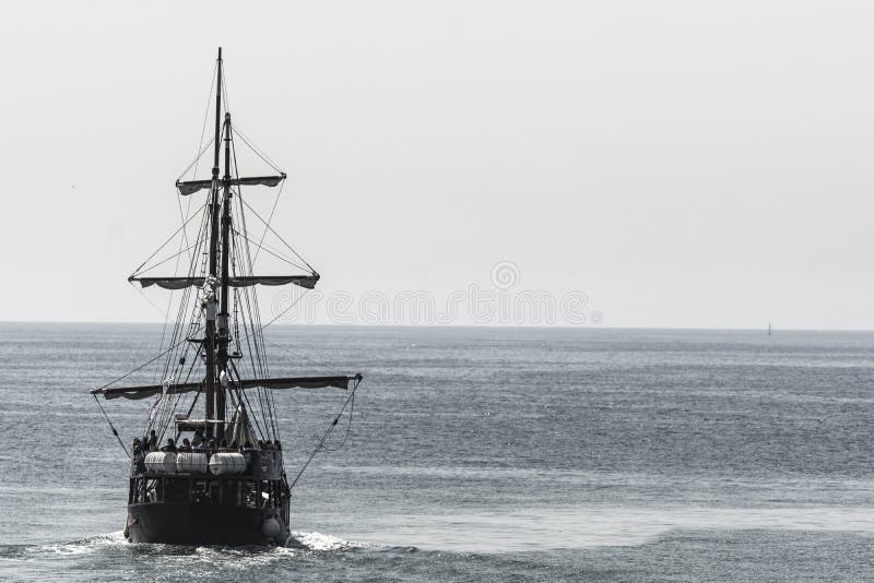 Single Ship Sailing on a Calm Water Surface Approaching a Coast Stock ...