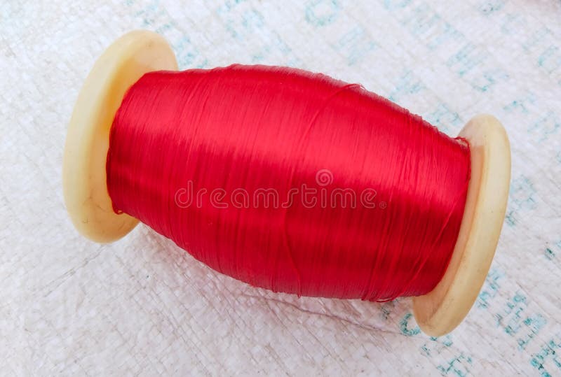Single Silk Thread Spool on Plastic Carpet Stock Image - Image of india ...