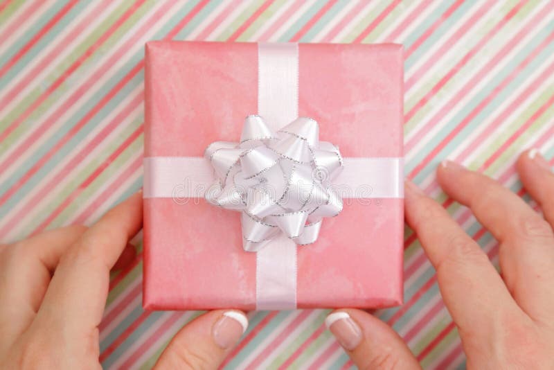 Single Simple Wrapped Present on a Matching Background Stock Image ...