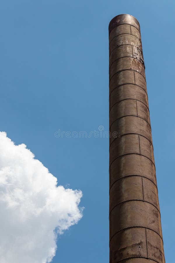 Single Smoke Stack Blowing White Puffy Smoke into Blue Sky Landscape ...
