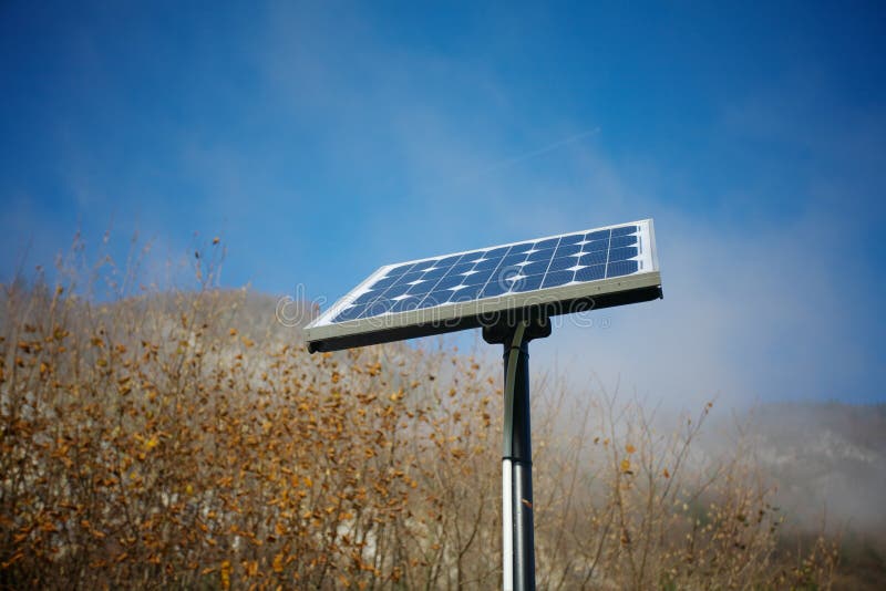 A Single Solar Panel with a Blue Sky and White Clouds in the Background ...