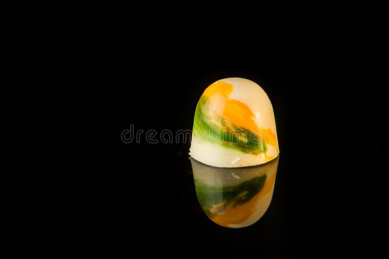 Single Sphere Shaped White Chocolate Candy with Colorful Decoration ...