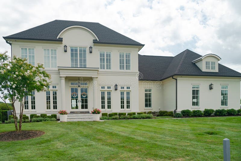 Single-story Modern White Brick Single Family Home with Front Lawn ...