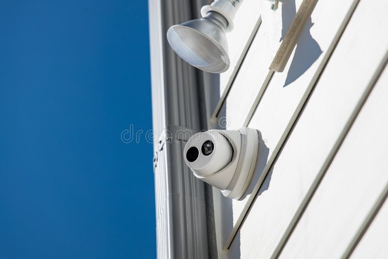 Single-story Residential Structure with a Security Camera Mounted on ...
