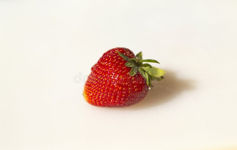 Single Strawberry on white stock photo. Image of natural - 102658