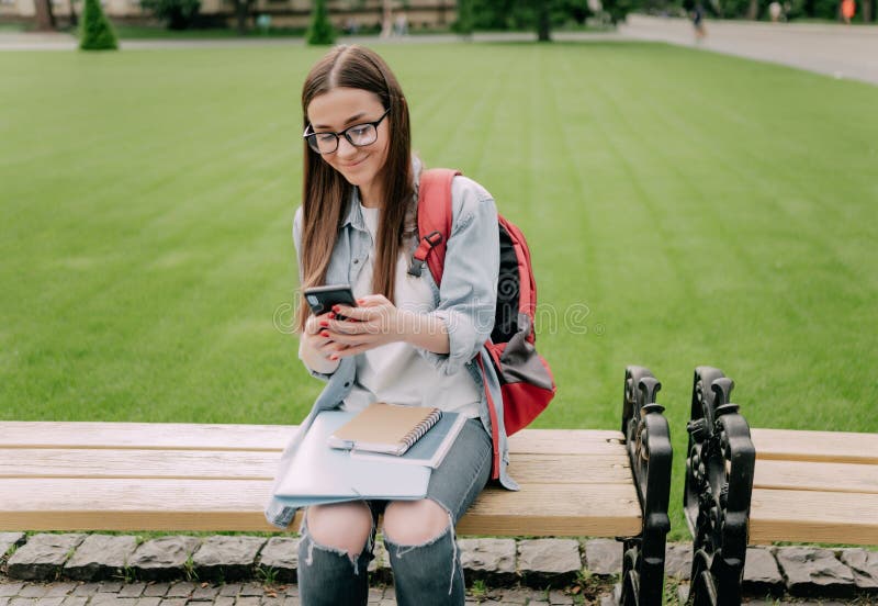 Single Student Reading Mobile Phone Messages Stock Photo - Image of ...