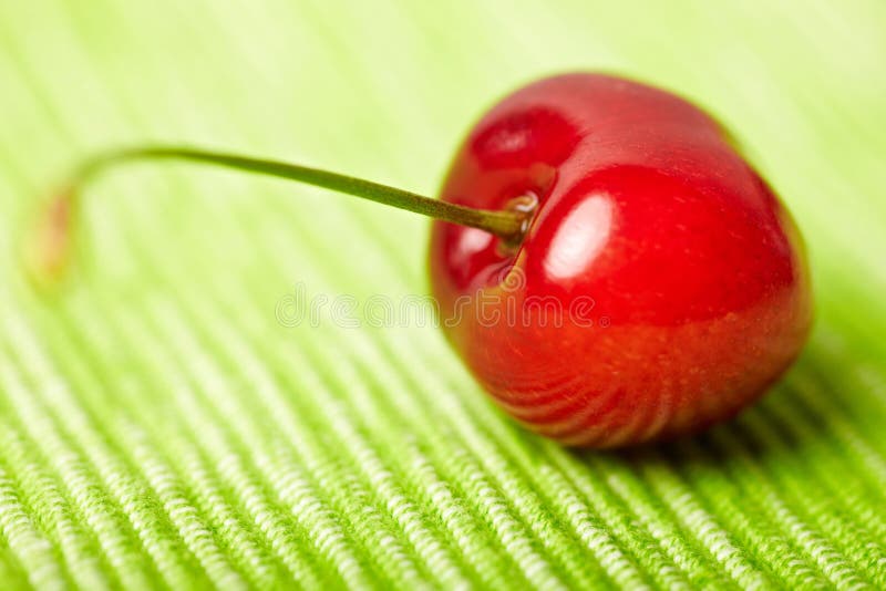 Single sweet cherry stock image. Image of ripe, tablecloth - 19989655