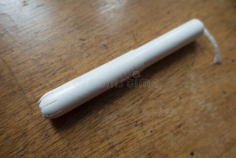Single Tampon with Cardboard Applicator Stock Photo - Image of tampon ...
