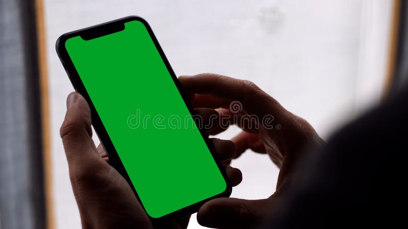 Single Tapping and Holding a Green Screen IPhone Stock Image - Image of ...
