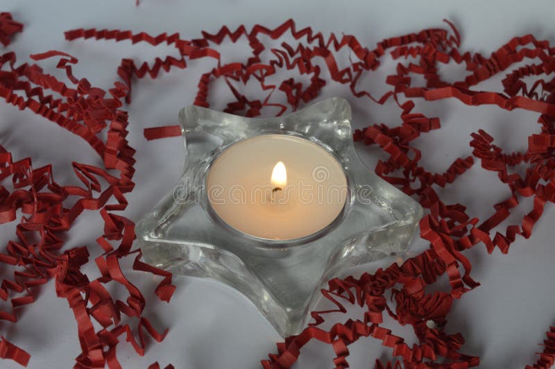 Single tealight candle stock image. Image of raffia - 105548219