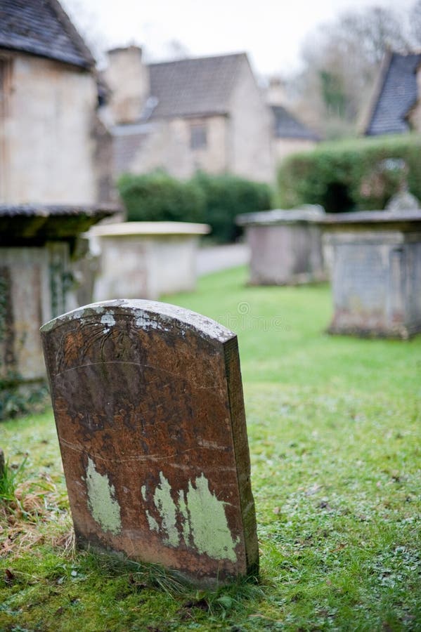 Single Tombstone with RIP Sign in Old Graveyard. Close Up of Gravestone ...