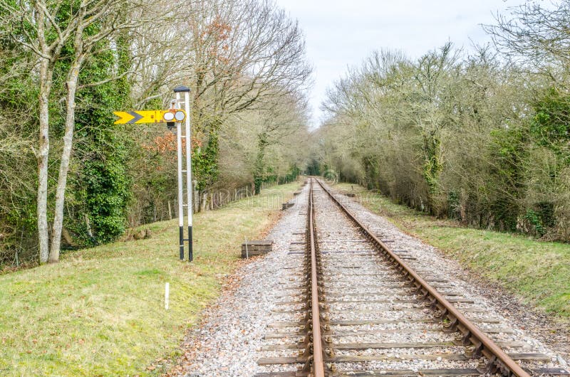 Single Track Railway Line with Yellow Signal Stock Image - Image of ...