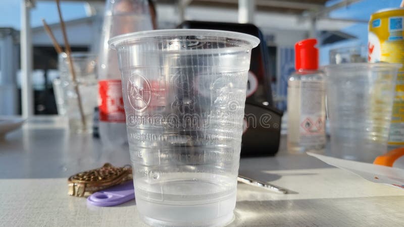 Used Plastic Cup and Microplastic Debris Discarded on Sea Coast ...