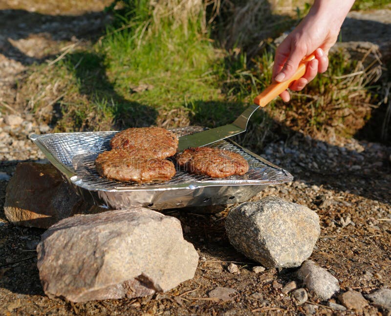 Single use grill stock photo. Image of hand, time, meat - 71376828