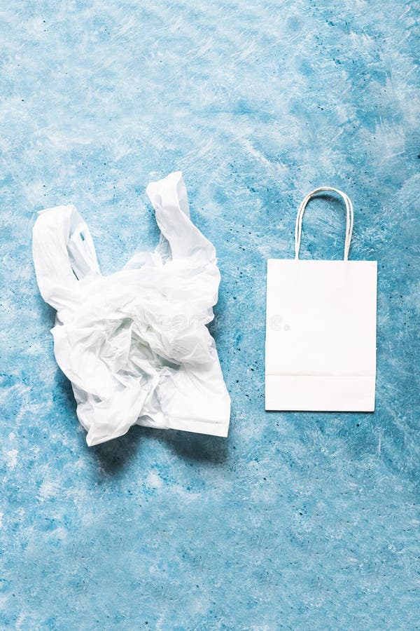 Single Use Plastic Bag Next To Paper One, Plastic Pollution and ...
